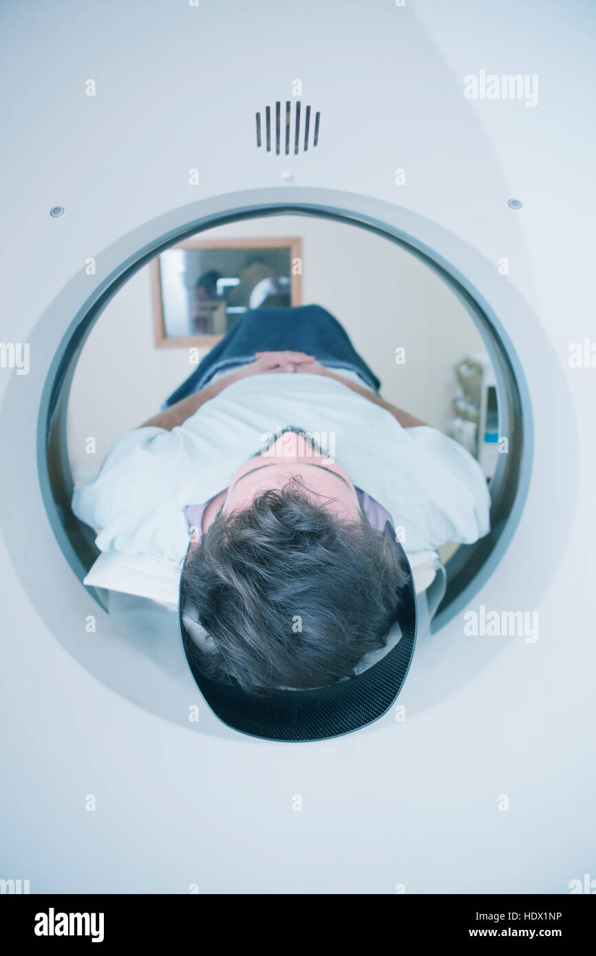 Hispanic patient in scanner Stock Photo - Alamy