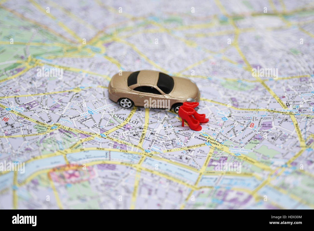 Woman drives car - abstract composition with small car and city map ...