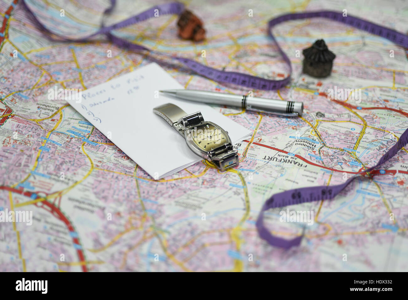 Planning route of city visiting. Big map on table with equipment Stock ...