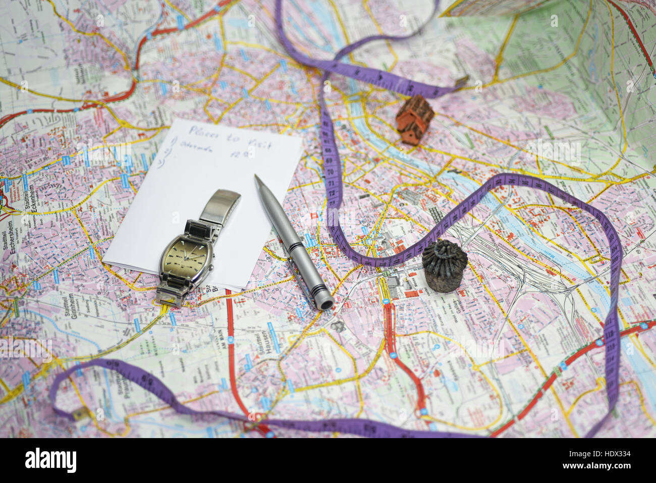 Planning route of city visiting. Big map on table with equipment Stock ...