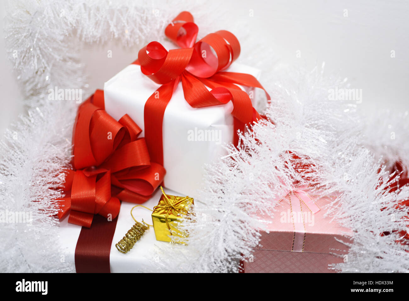 White presents with red ribbons, isolated on white background Stock ...