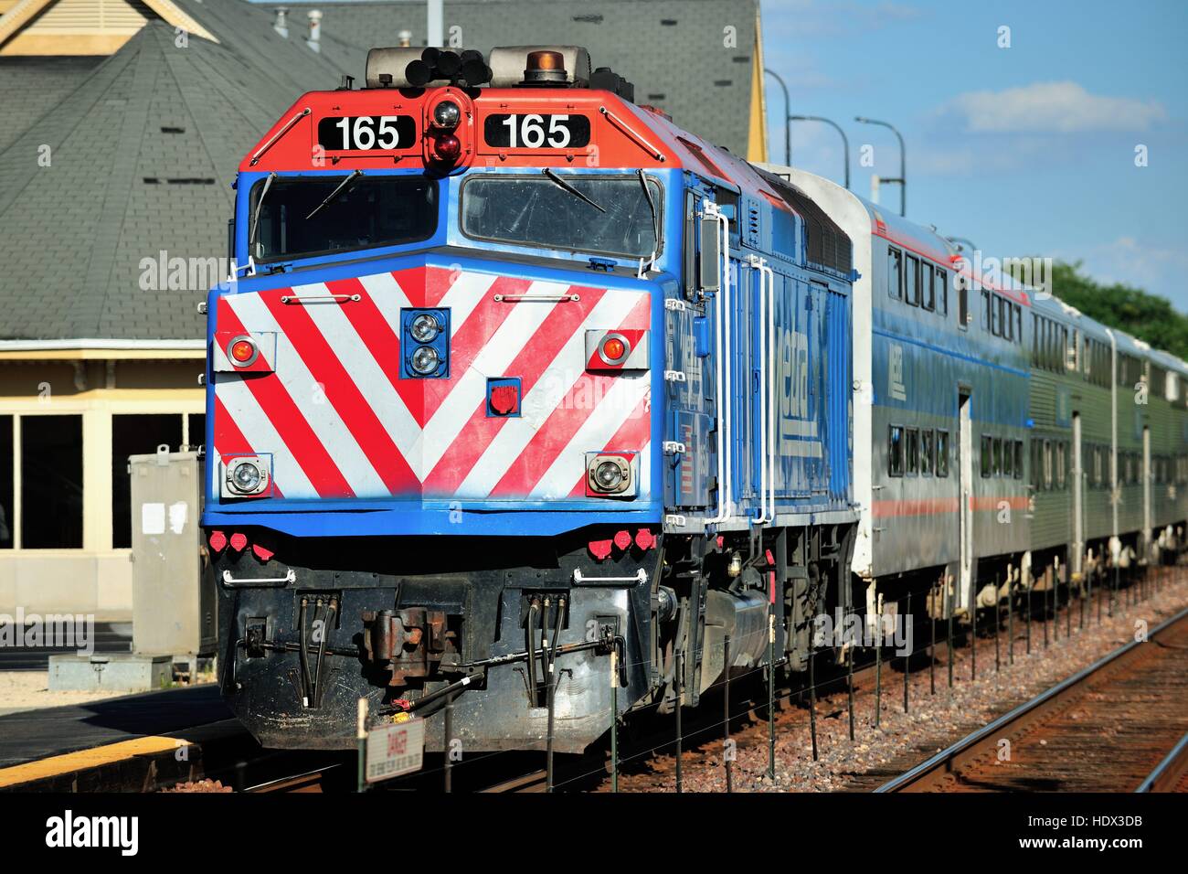 A Metra commuter train, using push-pull techniques arriving at Geneva, Illinois on its way to ...