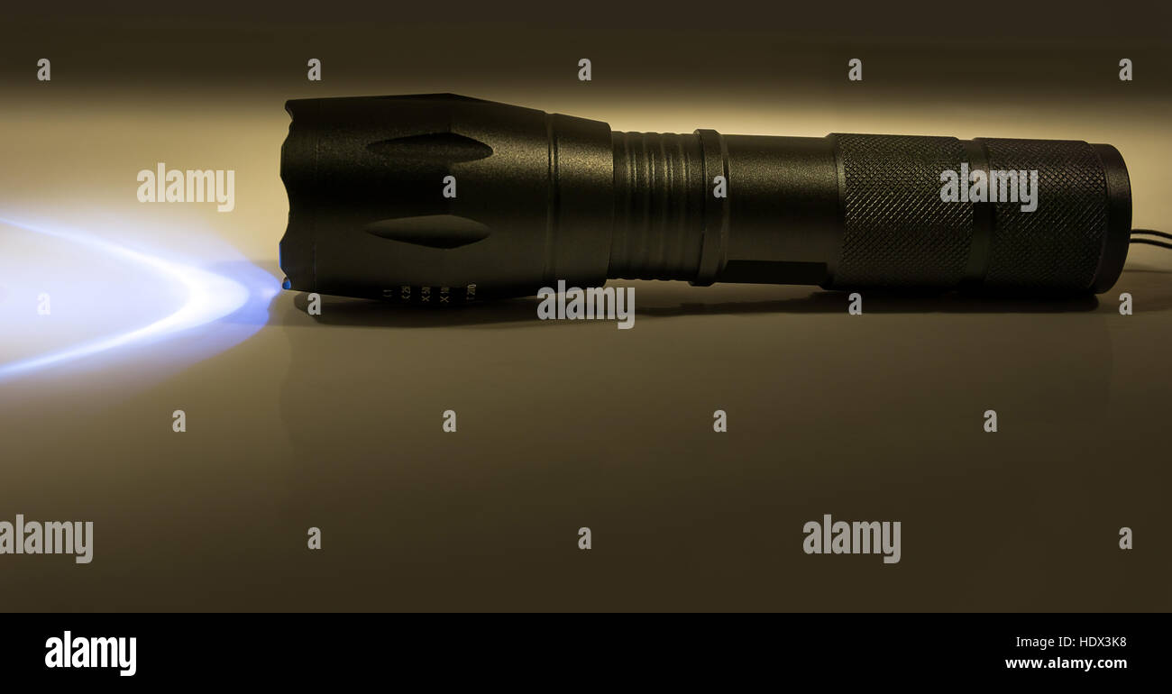 Flashlight turned on Stock Photo - Alamy