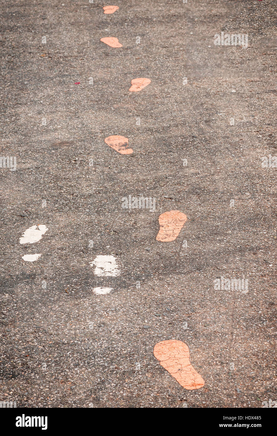 Footprints on walking track Stock Photo - Alamy