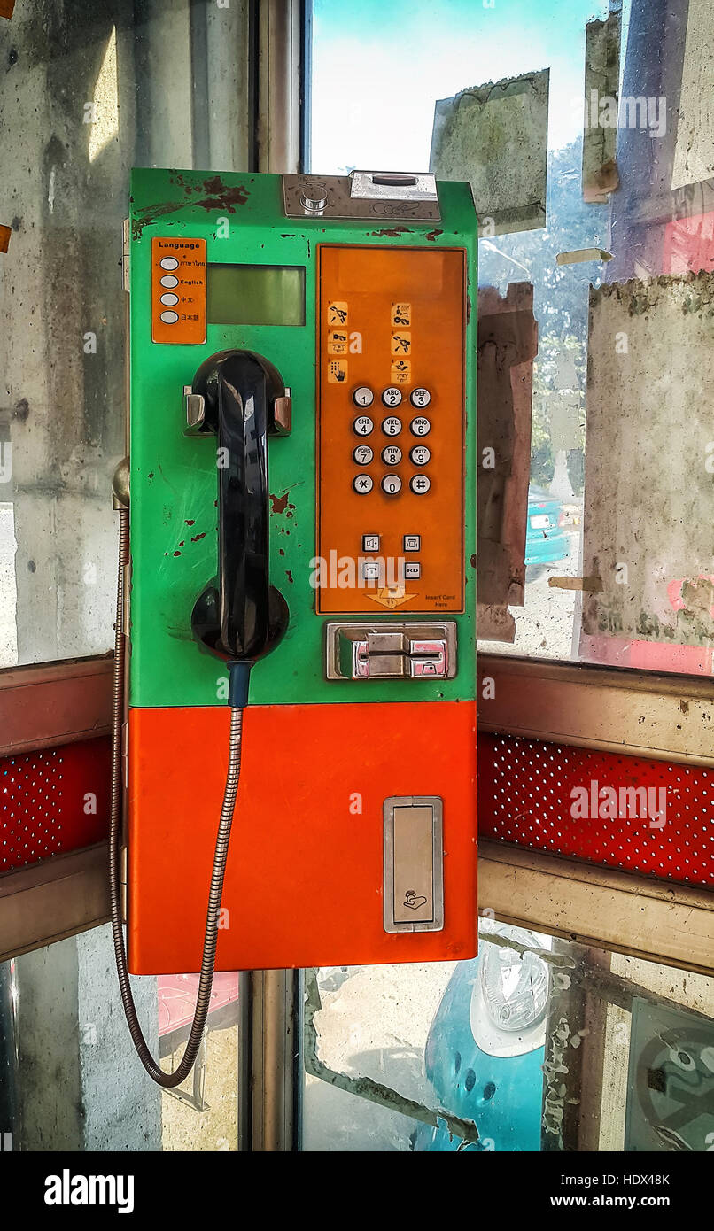 Old public telephone coin and card Stock Photo - Alamy