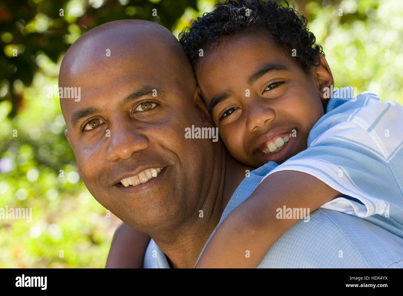 African American father and son spending time together Stock Photo - Alamy