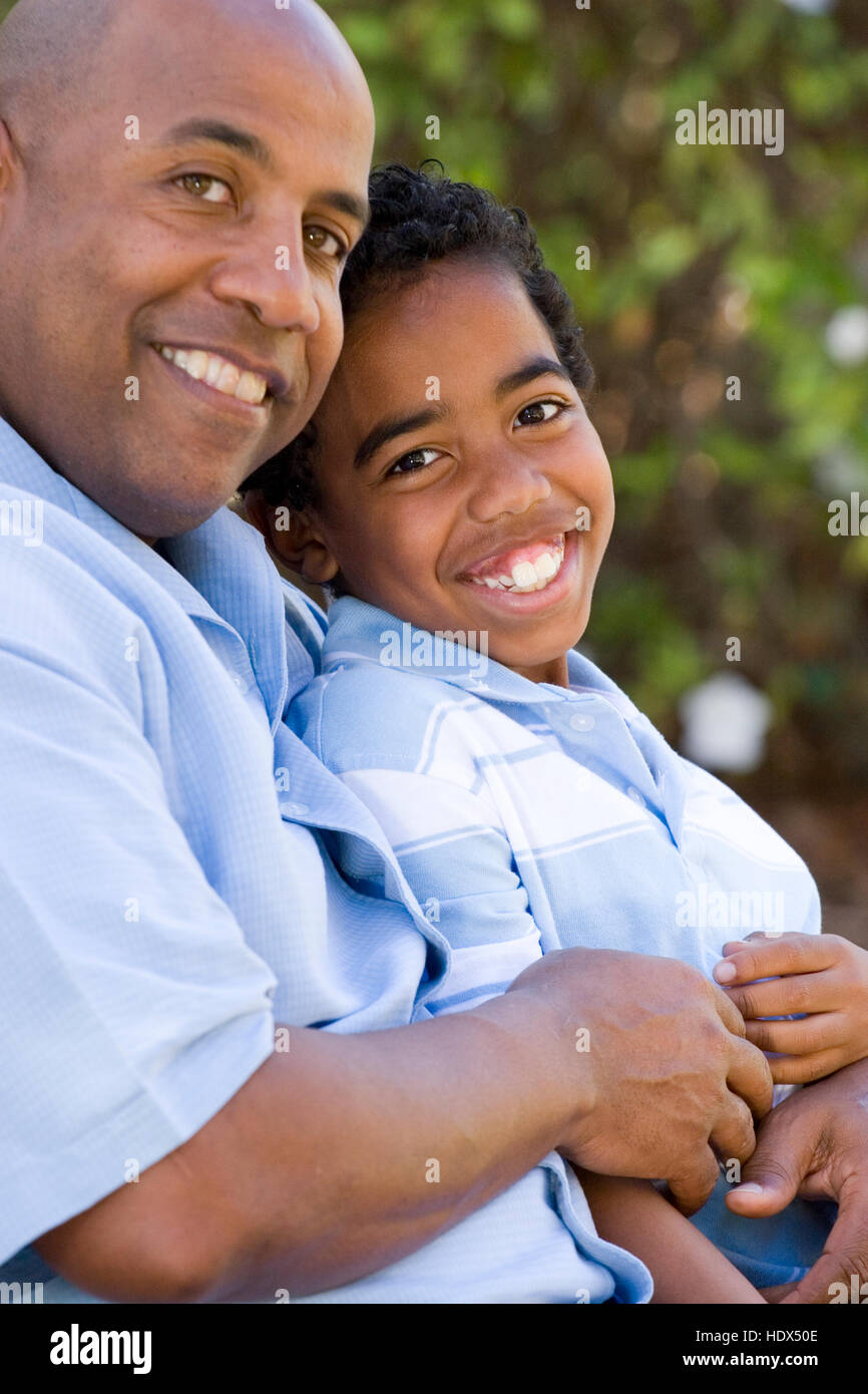 African American father and son spending time together Stock Photo - Alamy