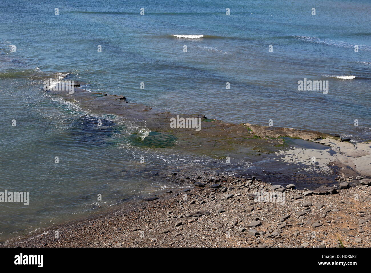 Restful seascape over Kimmeridge Ledges from South West Coast Path UK ...