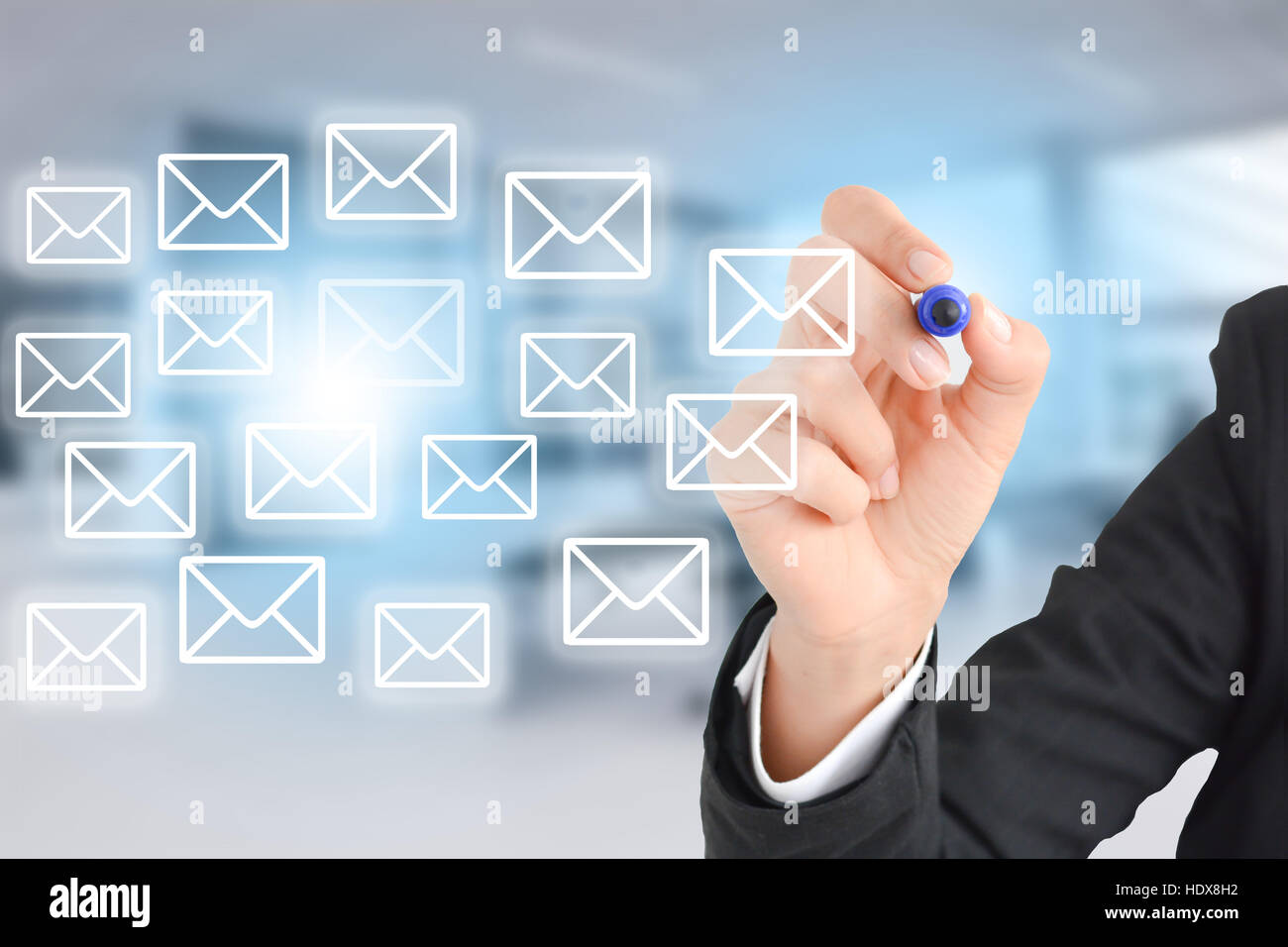 Business woman drawing e-mail messages in office concept Stock Photo ...