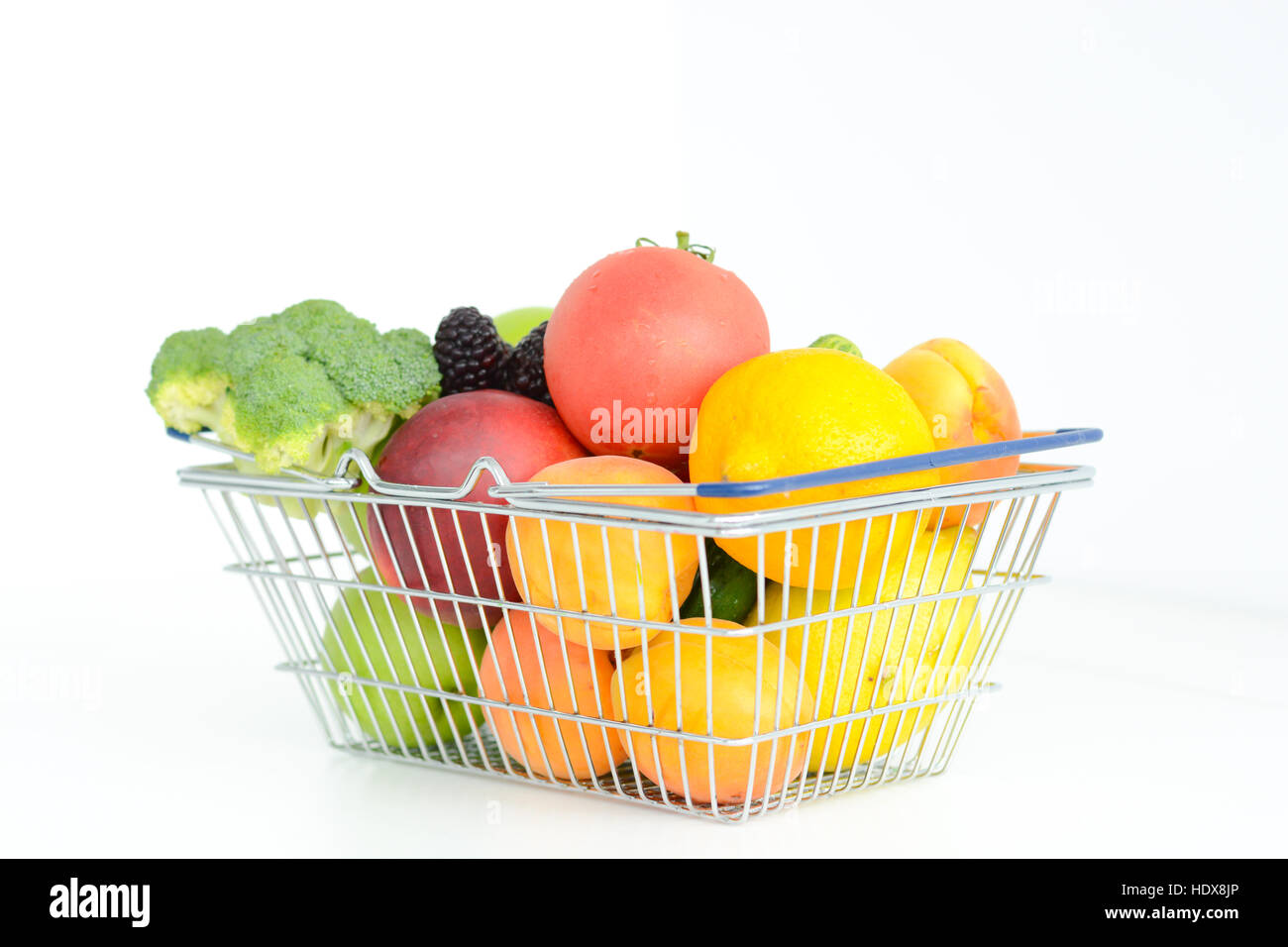 Fresh fruit and vegetables basket Stock Photo - Alamy