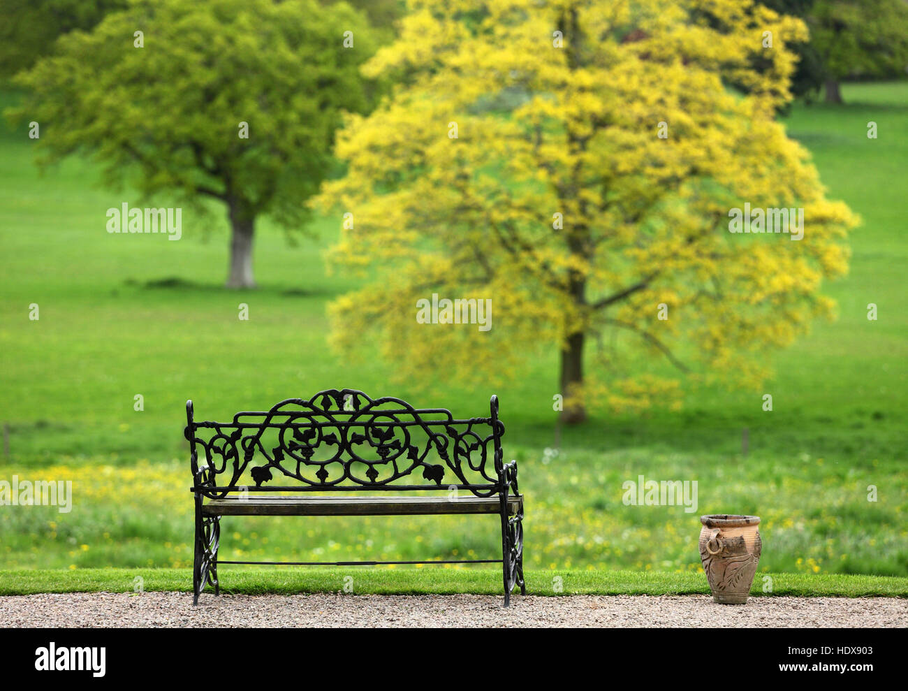 Rear view of a garden bench seat looking out over glorious countryside ...