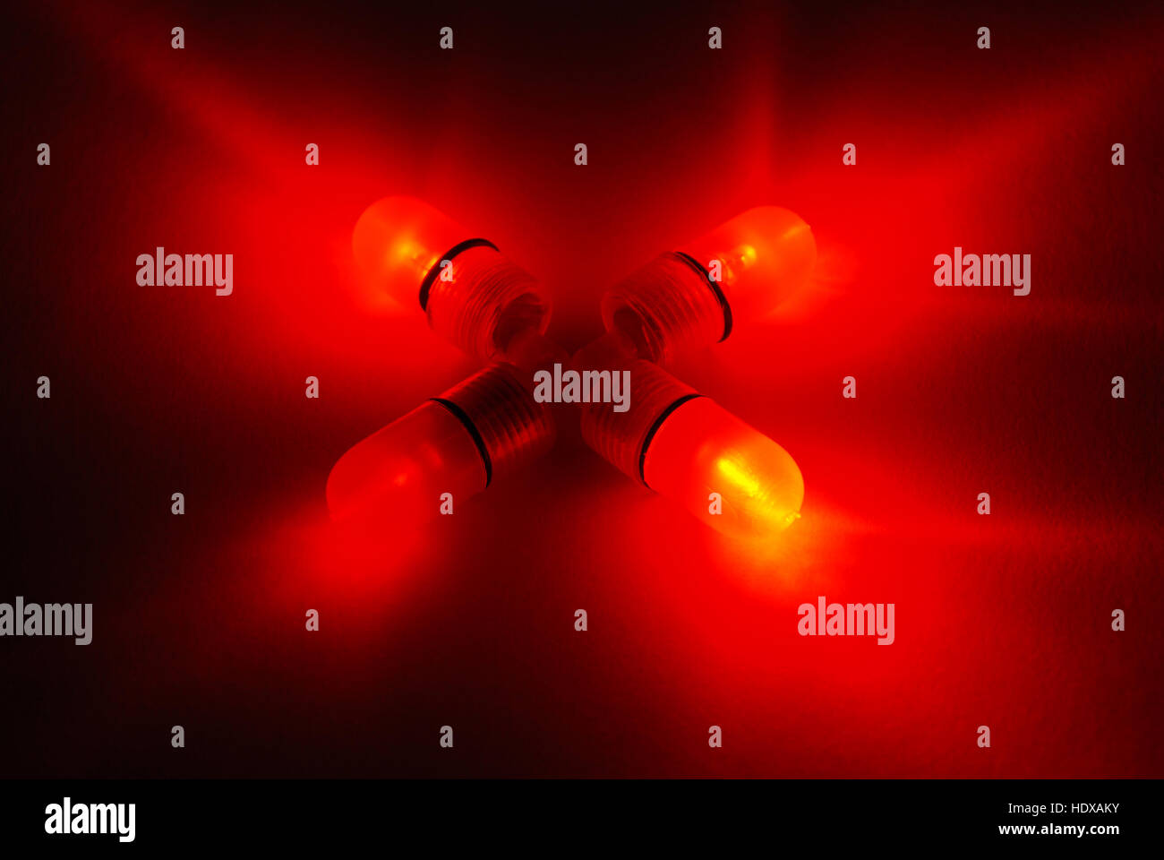 Fishing four red LED power indicators isolated on black background ...
