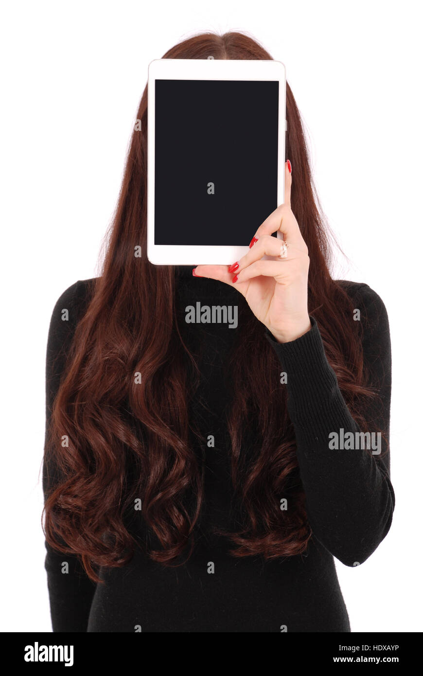 Girl keeps tablet pc the face isolated on white Stock Photo - Alamy