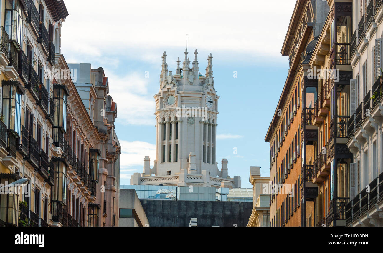Classic Spanish architecture flanked on each side by rows of warm ...