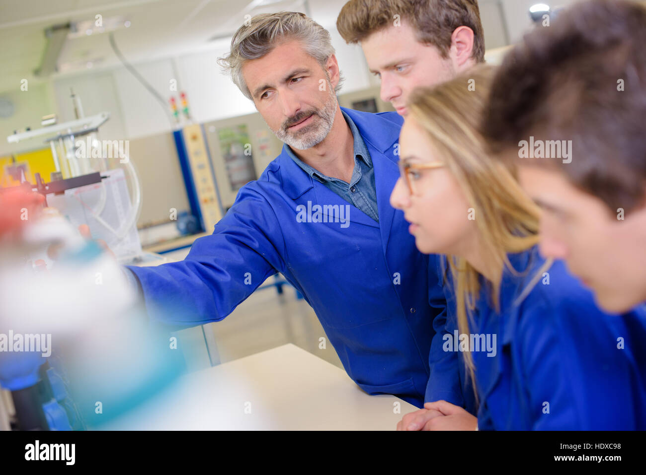 Lab overalls hi-res stock photography and images - Alamy