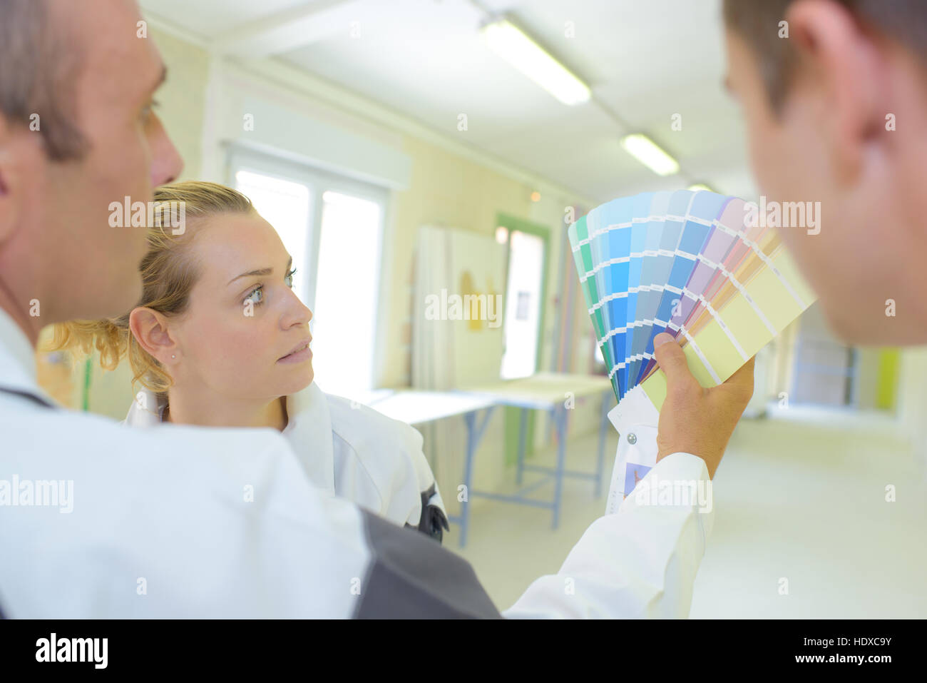 interior decorators with color wheel Stock Photo - Alamy