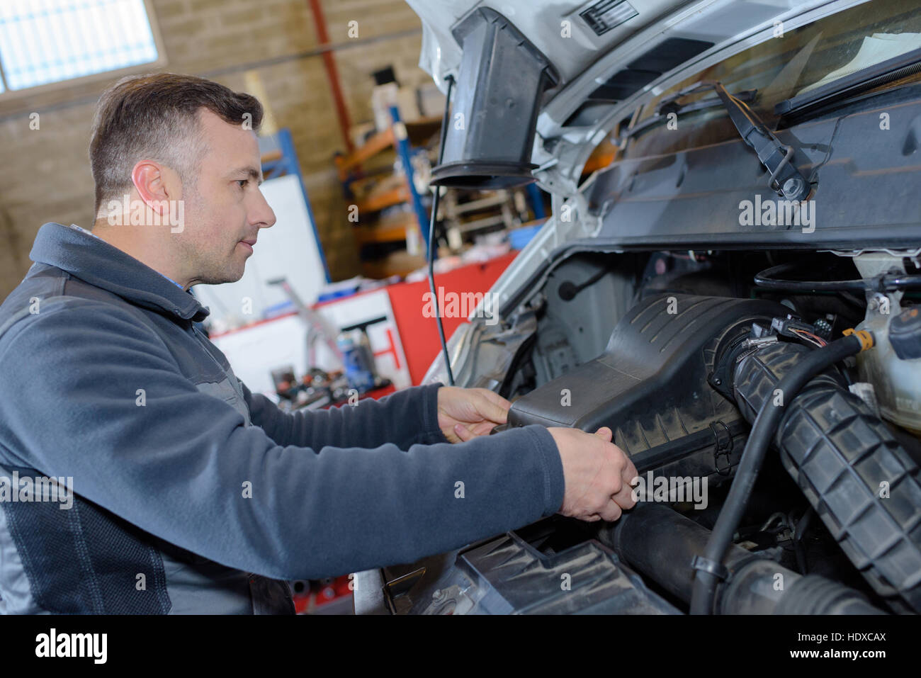 portrait of male mechanic at work in the garage Stock Photo - Alamy