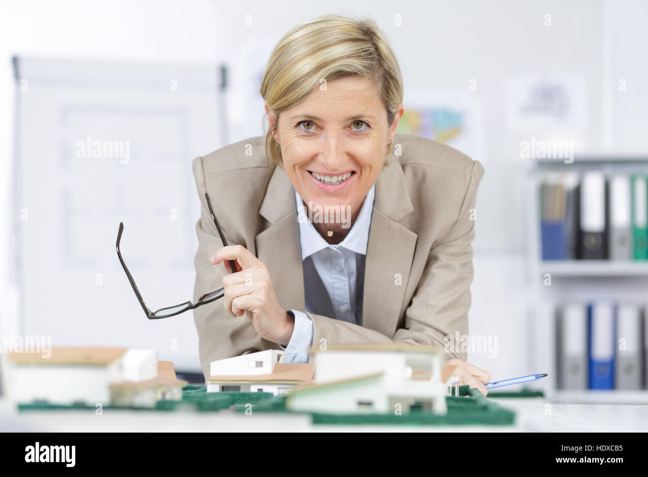 Attractive female real estate agent hi-res stock photography and images ...