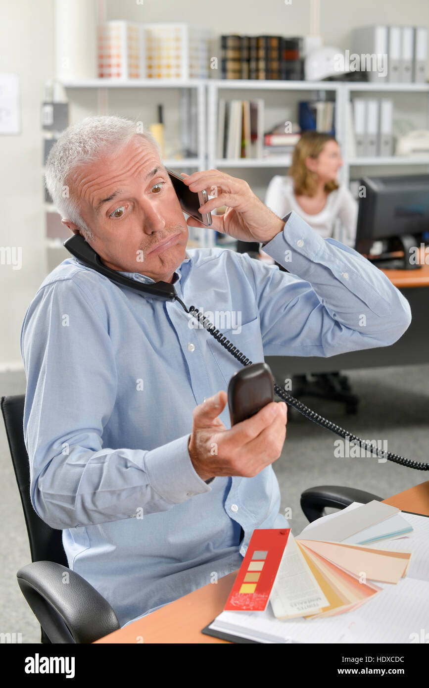 Overworking man hi-res stock photography and images - Alamy