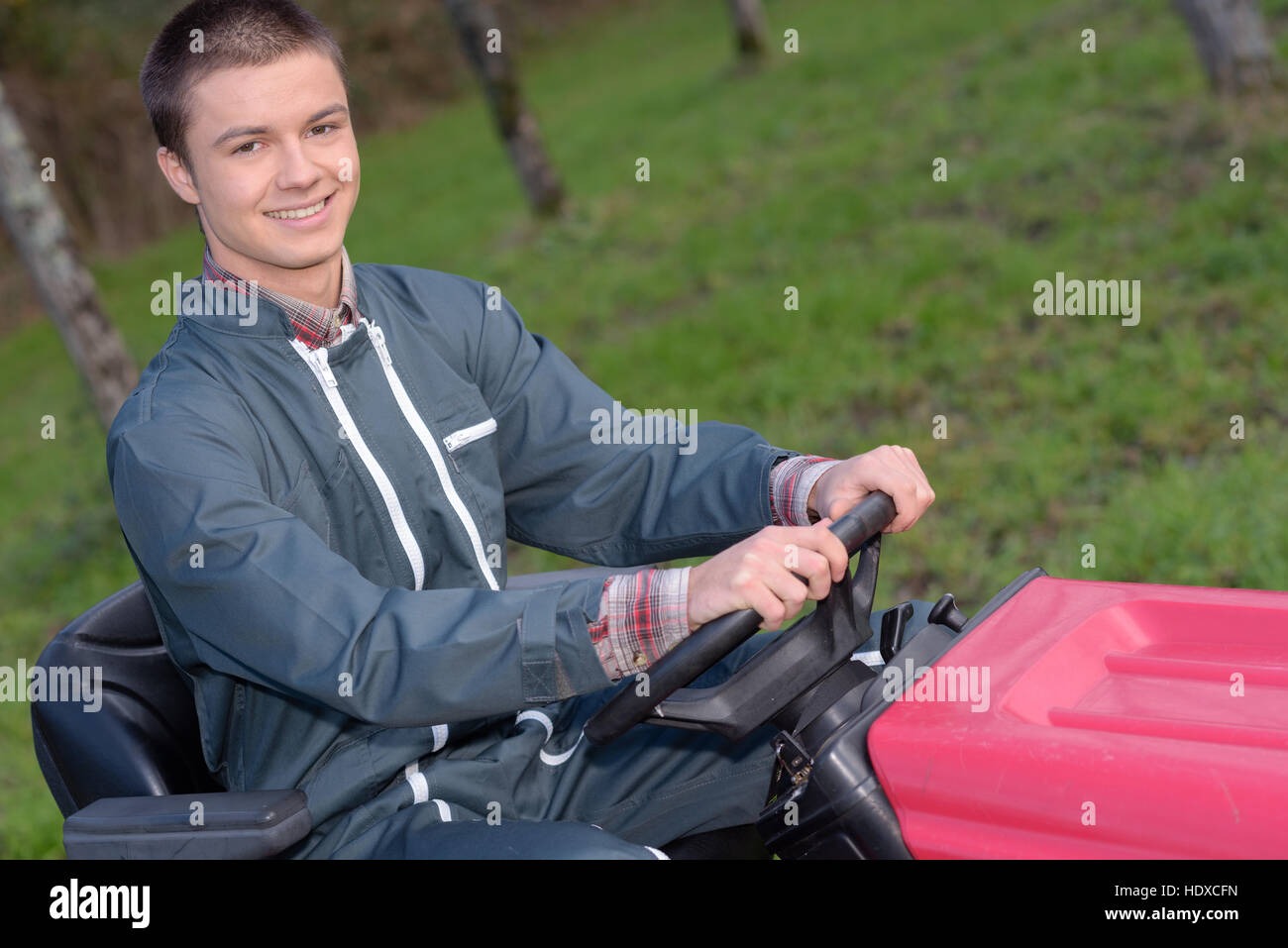 operating a garden tractor Stock Photo - Alamy