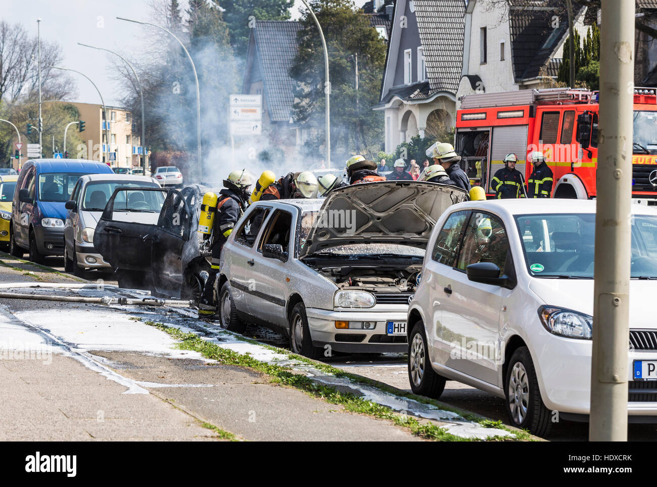 Fire brigade car street hi-res stock photography and images - Alamy