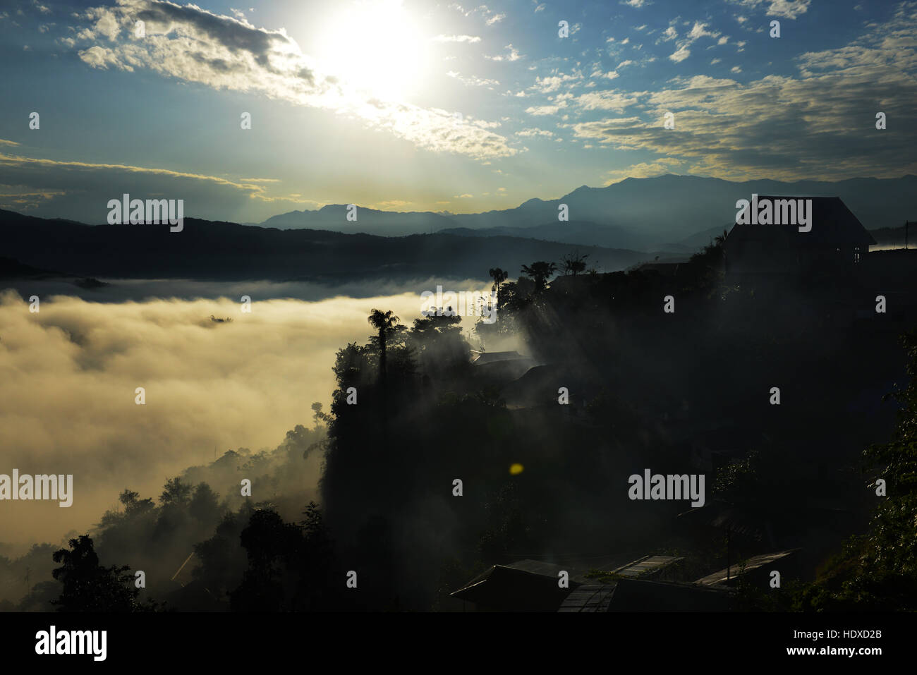 A beautiful misty morning between the mountains of Mon district in ...