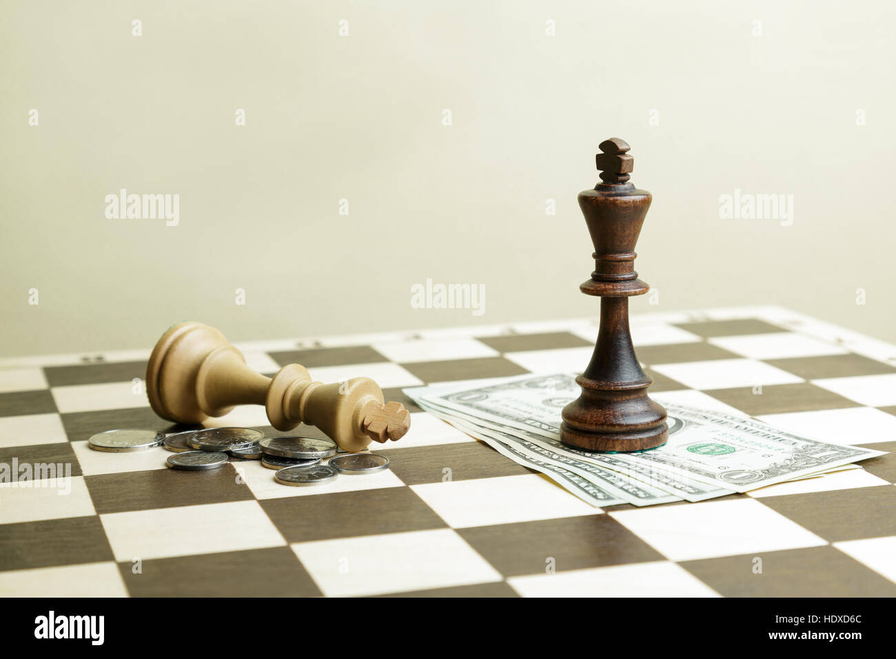 Chess kings with money for a chessboard Stock Photo - Alamy