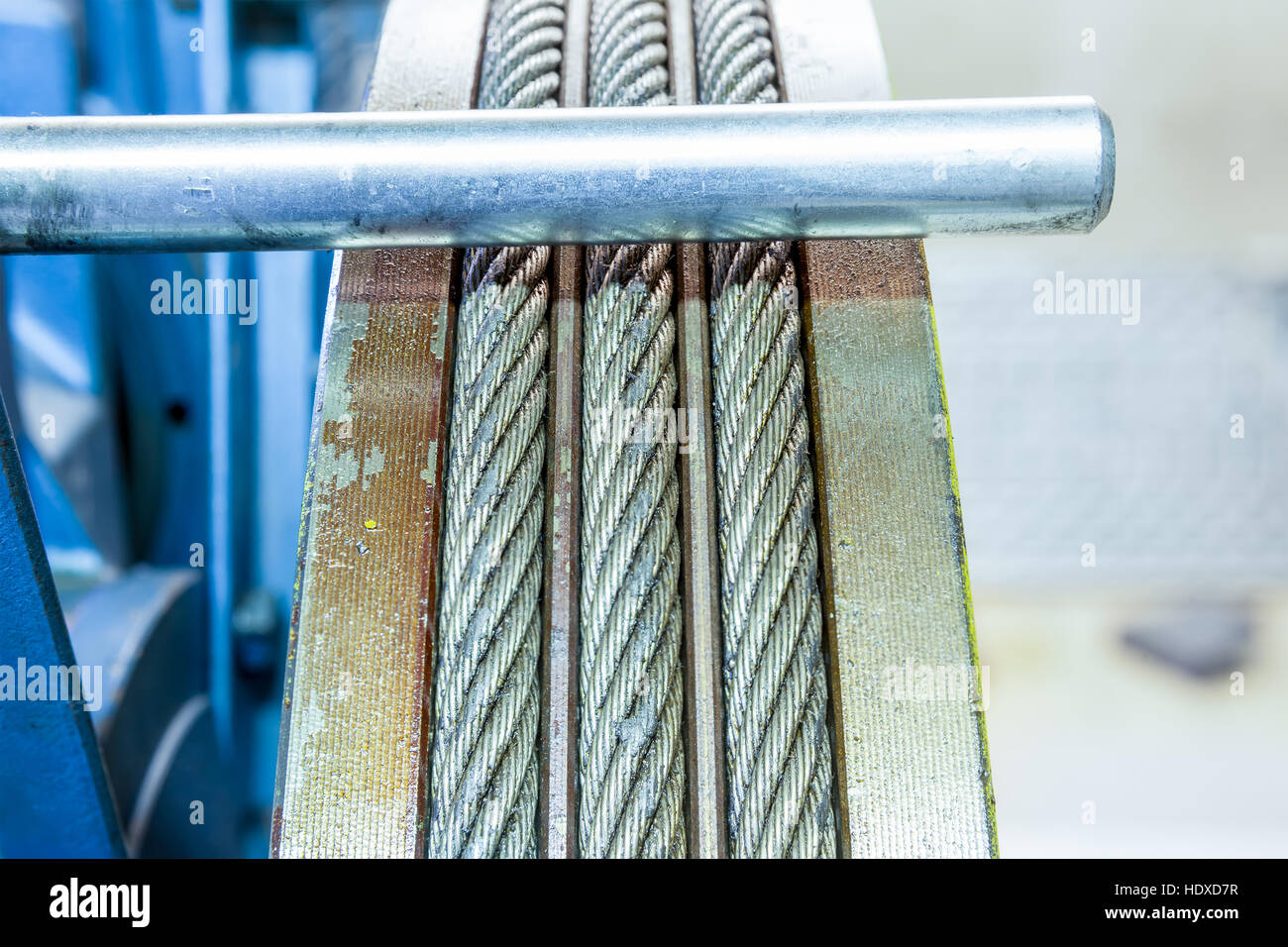 iron cables on a wheel of a motor of the elevator Stock Photo - Alamy