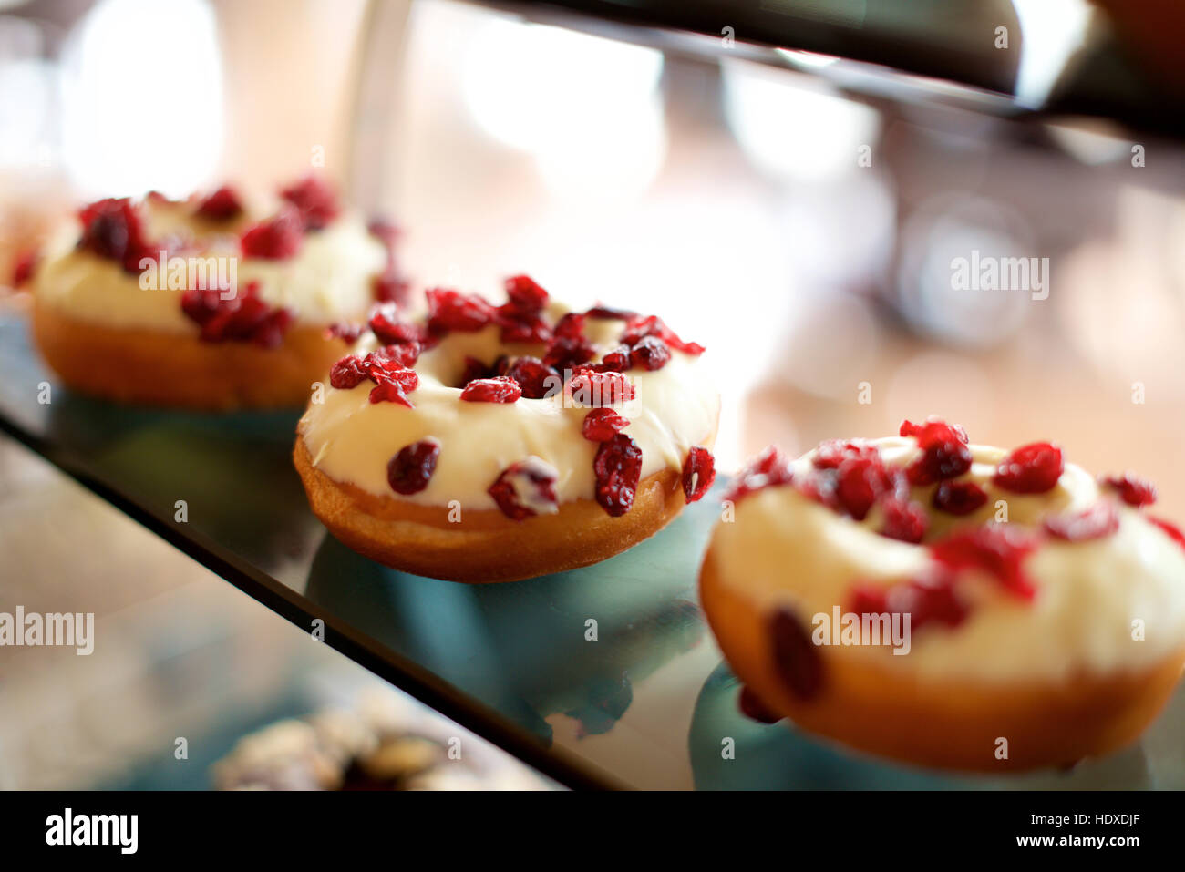 Chocolate Grapes Donuts in restaurant store Stock Photo - Alamy
