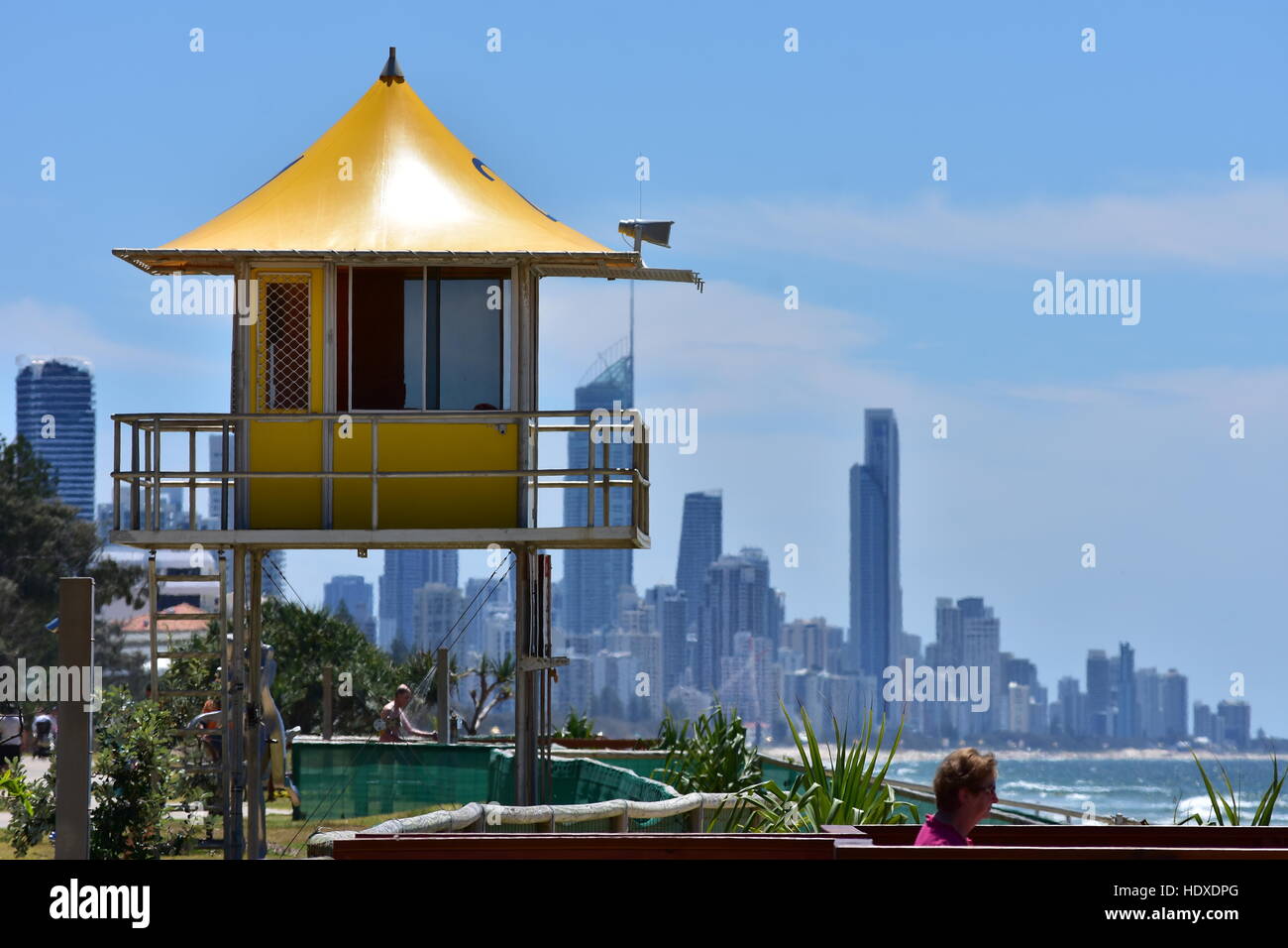 Yellow lifeguard post on elevated platform on sandy beach with ...