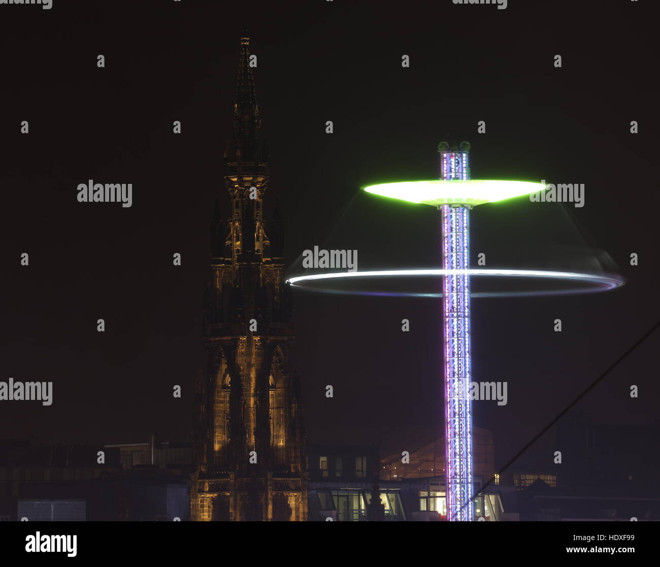 Star Flyer ride and Scott Monument by night Edinburgh Scotland December ...
