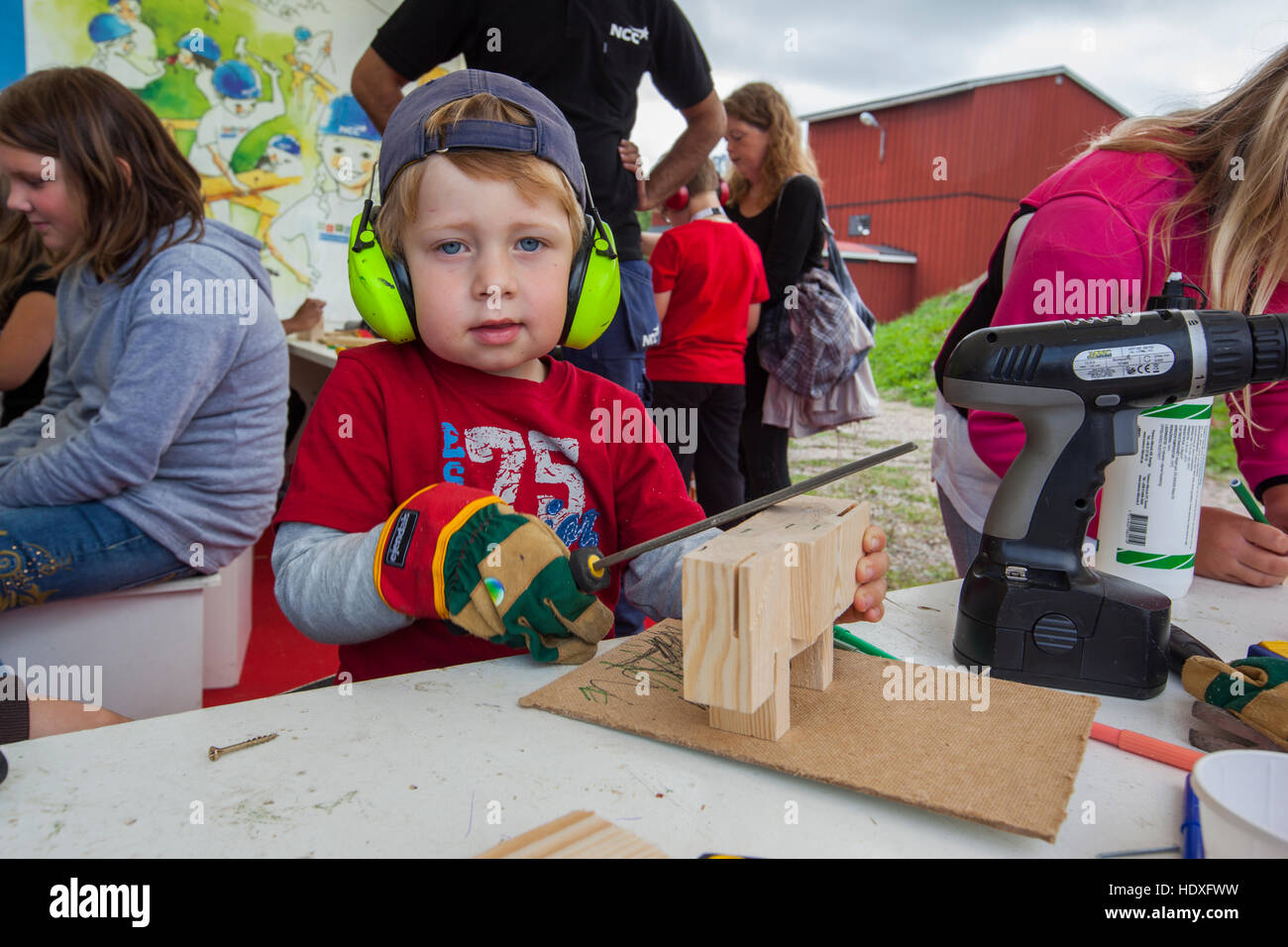Little boy with his carpentry Stock Photo - Alamy