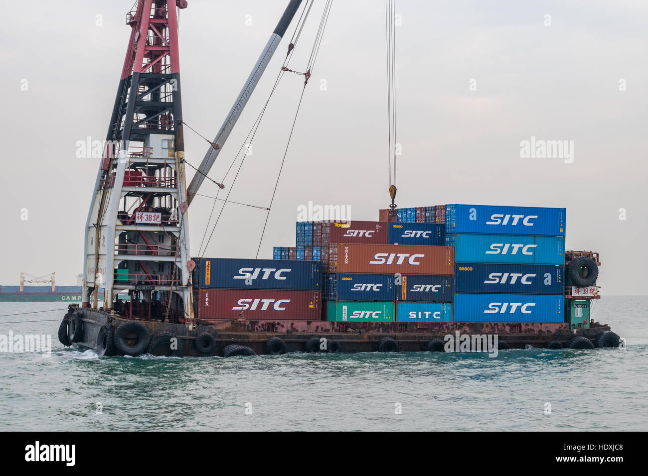 Shipping containers on a barge Stock Photo - Alamy