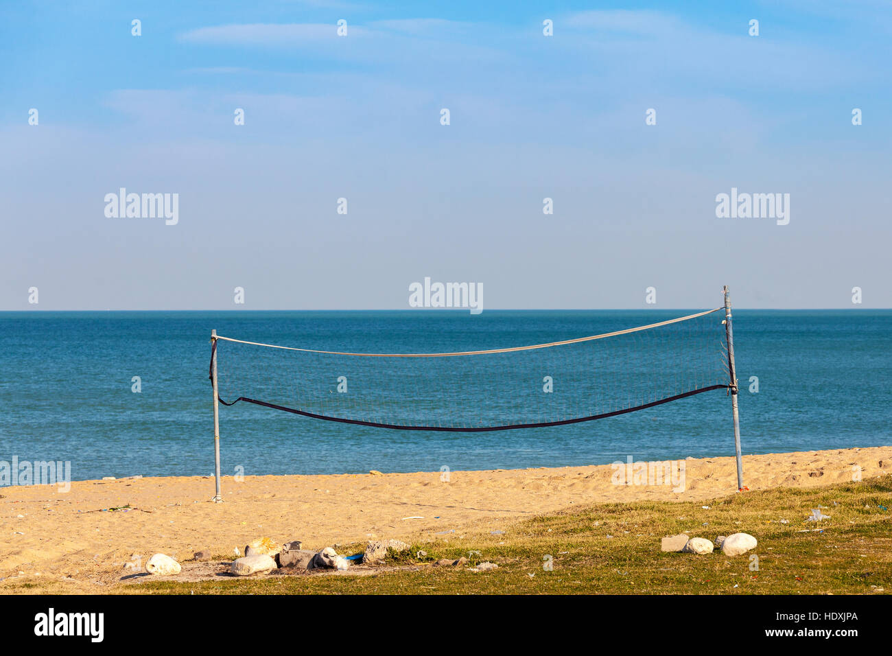 Old and neglected volleyball net on the beach Stock Photo - Alamy