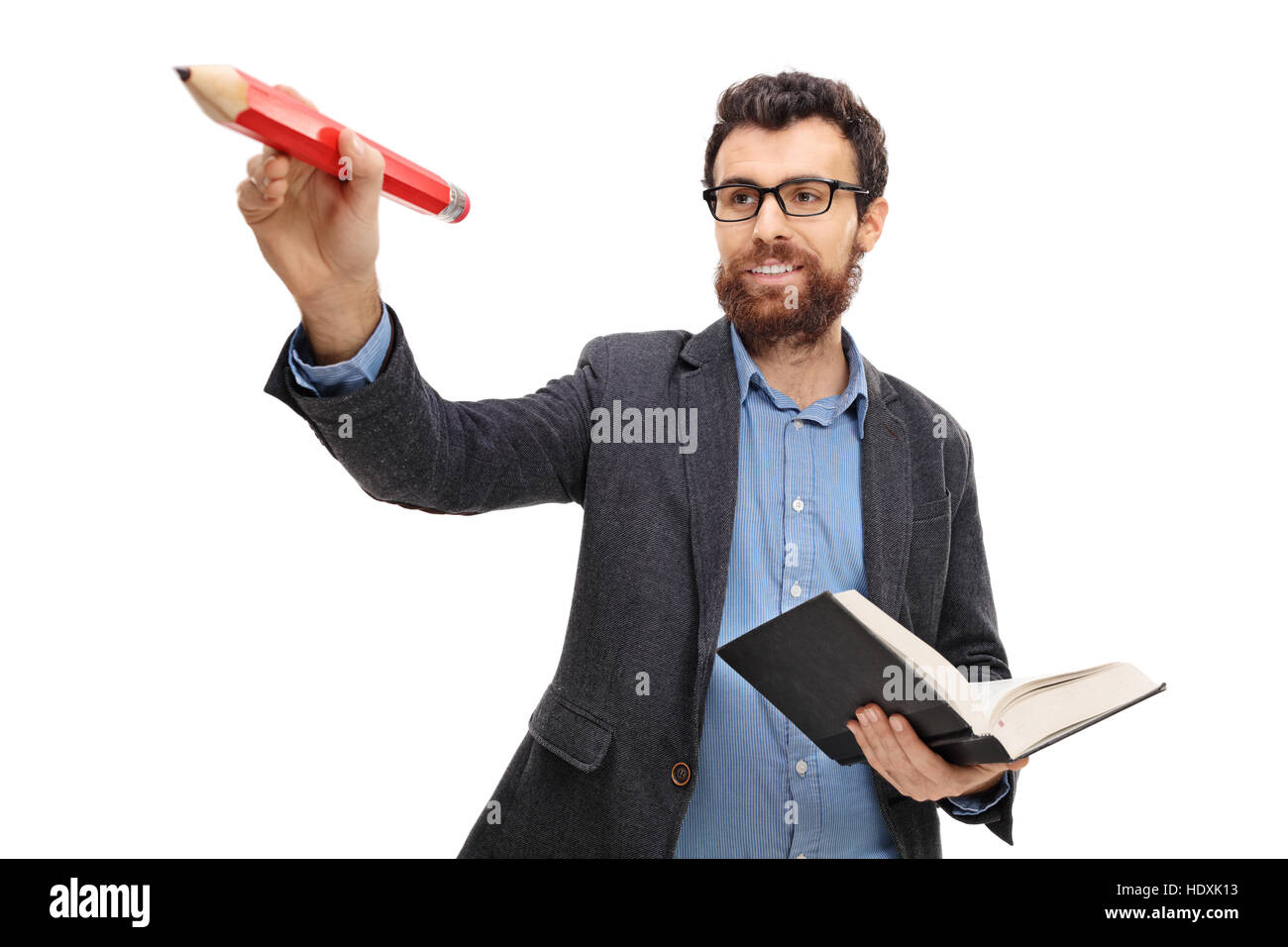 Young teacher writing with a pencil and holding a book isolated on ...