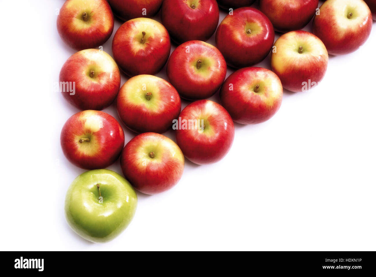 Apples arranged in a triangle Stock Photo - Alamy