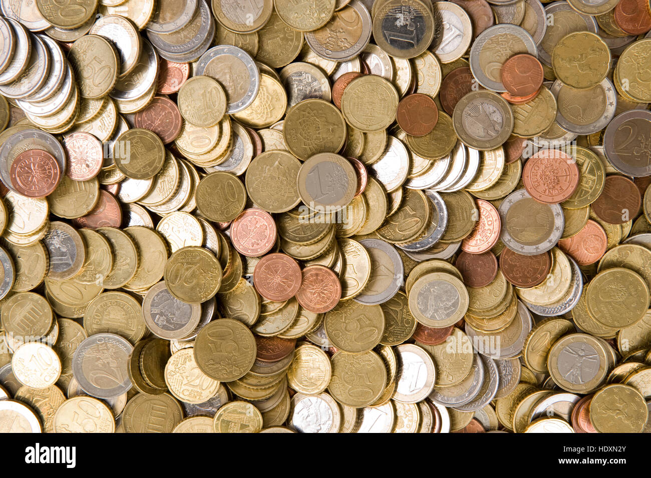 Many euro coins Stock Photo - Alamy