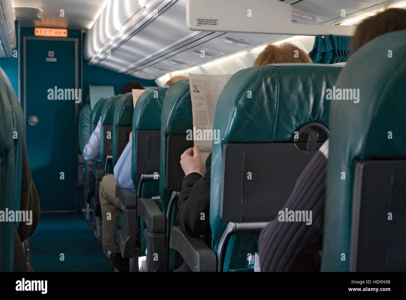 Passengers inside airplane hi-res stock photography and images - Alamy