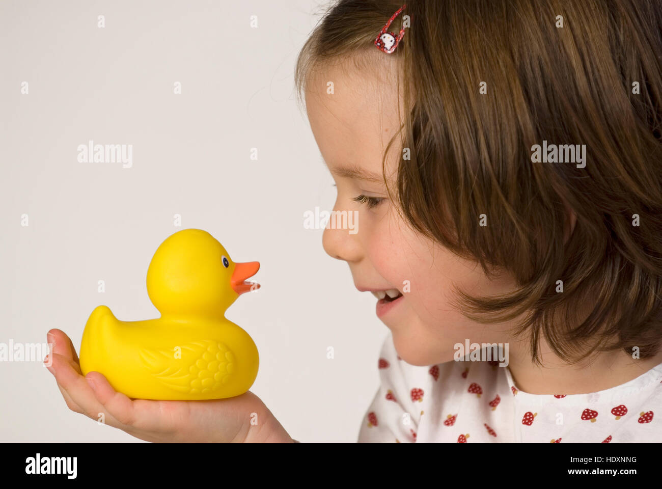Girl with a rubber duck Stock Photo - Alamy