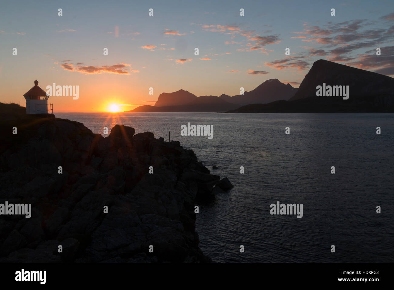 Lighthouse in the Midnight Sun, Sandnes, Lofoten, Norway Stock Photo ...