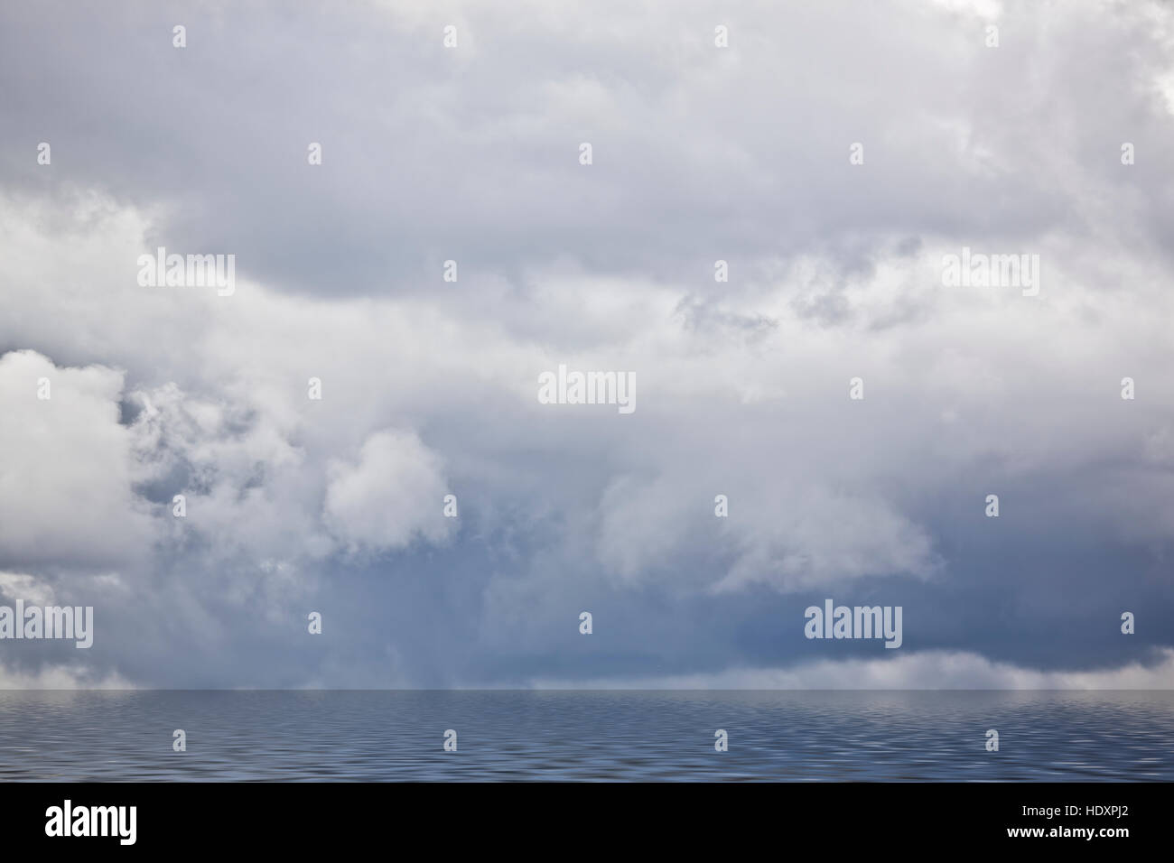 White and gray storm clouds over dark water Stock Photo - Alamy