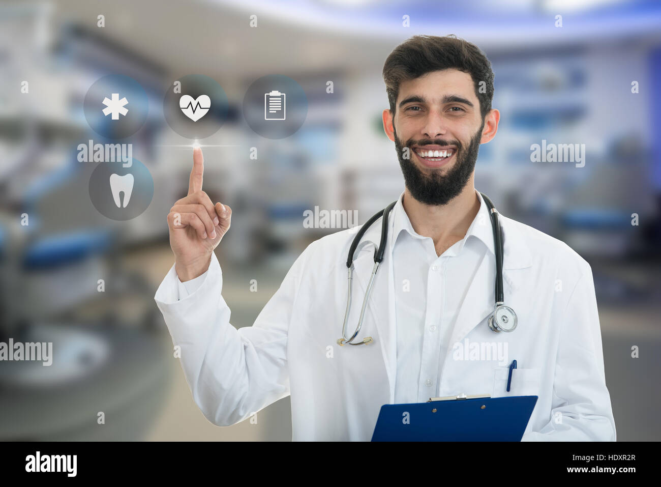 Male doctor makes a pointing finger gesture, in modern hospital Stock ...