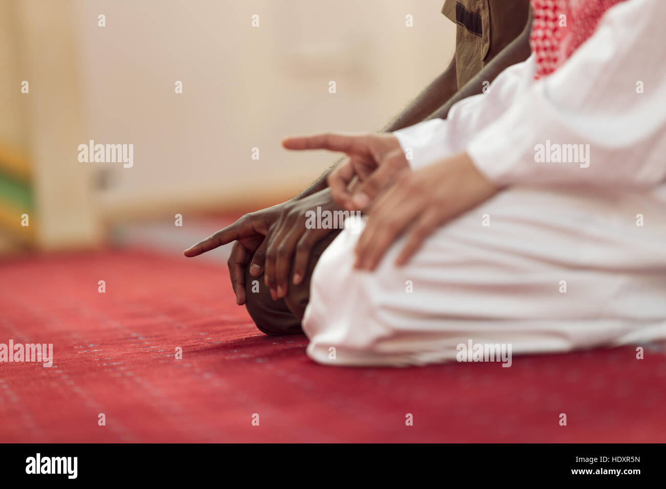 Two religious muslim man praying together inside the mosque Stock Photo ...