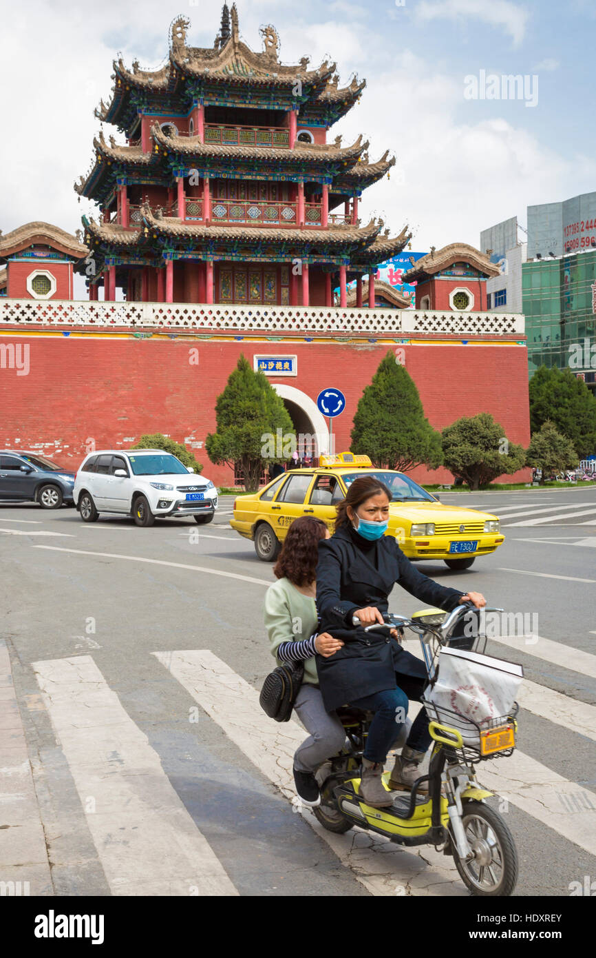 Chinese woman cyclist hi-res stock photography and images - Alamy
