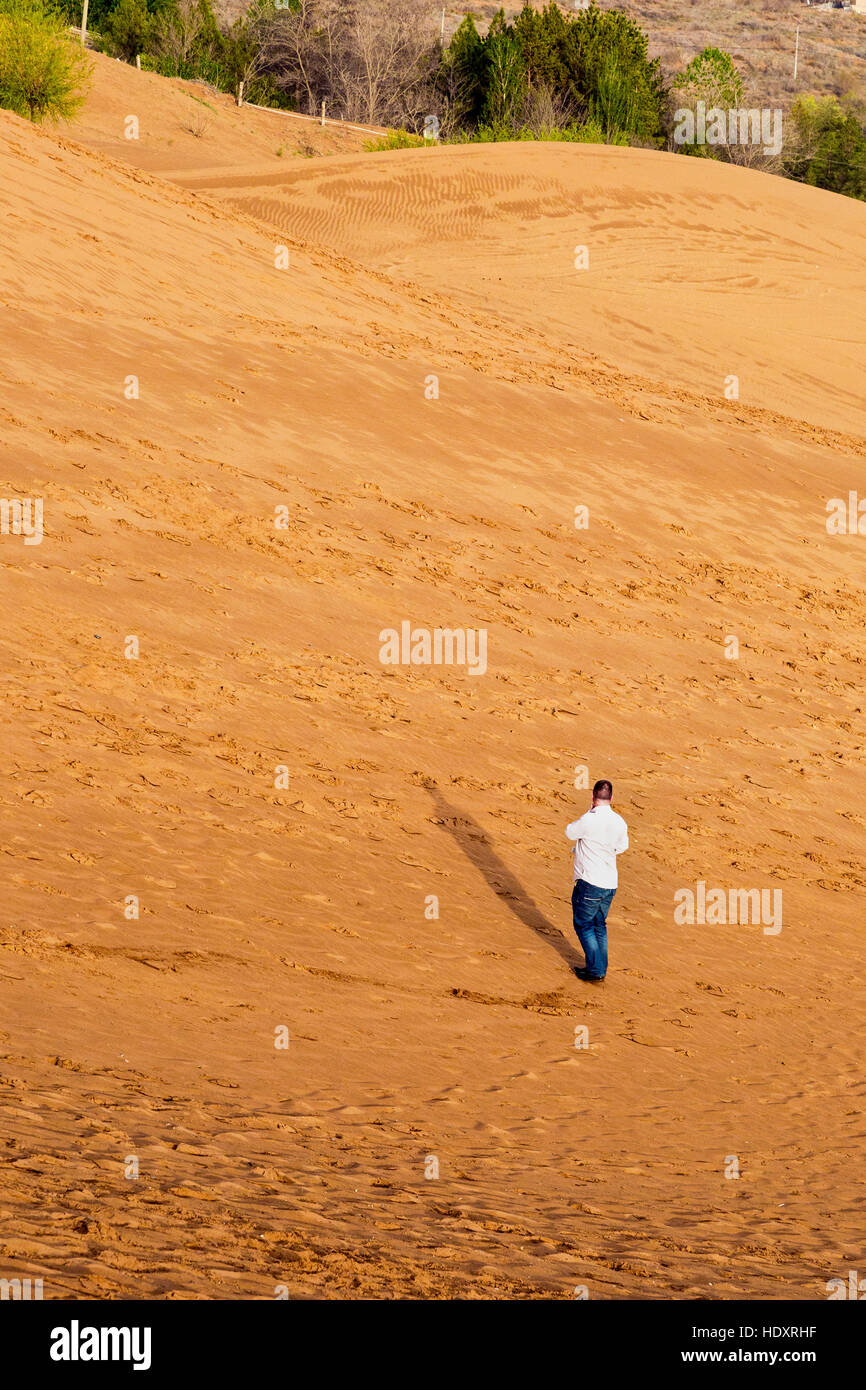 Lone tourist walking hi-res stock photography and images - Alamy