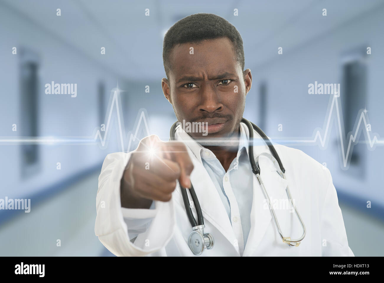 Angry african black male doctor pointing finger at you with stethoscope ...