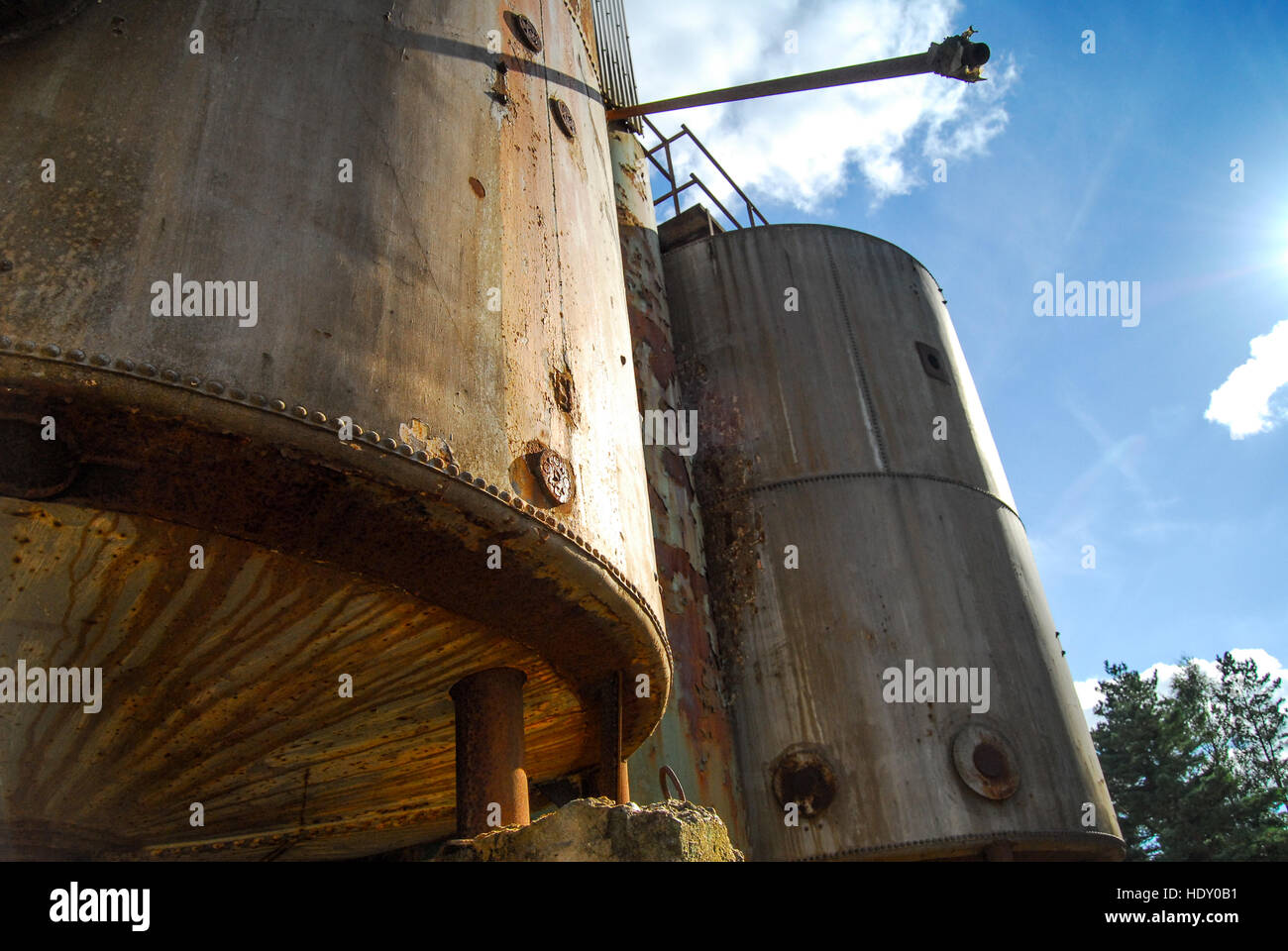 Old abandoned defaulted industrial building which stands with rusty and ...