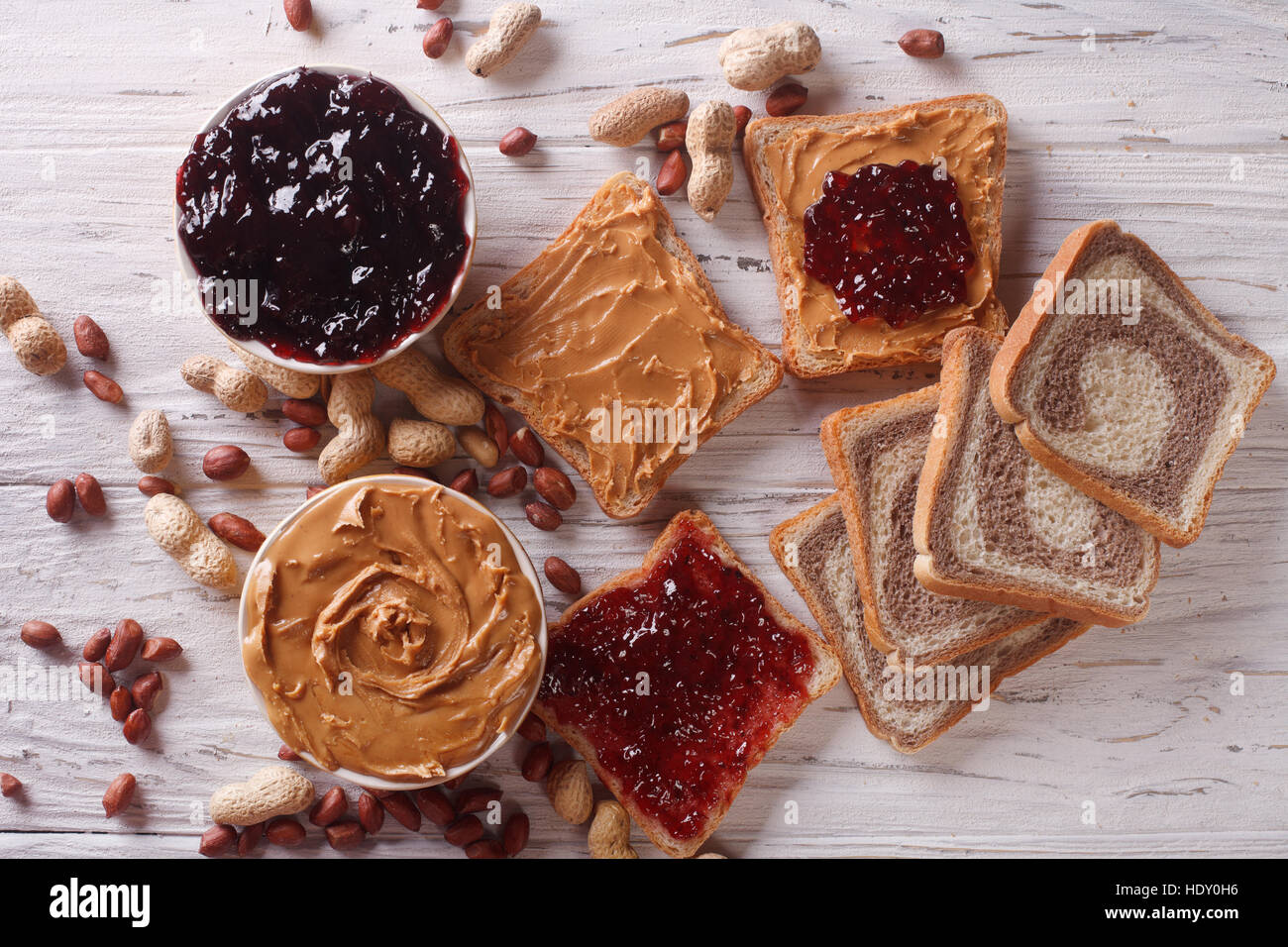 Sandwiches with peanut butter and jelly close-up on the table. horizontal view from above Stock ...