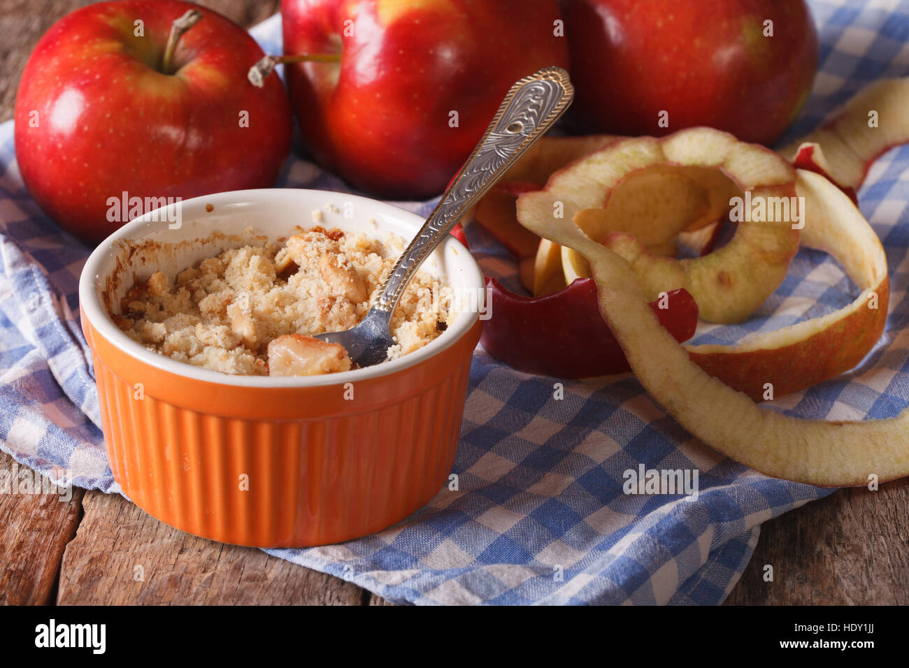 Delicious apple crumble close-up in a pot. Horizontal rustic style ...