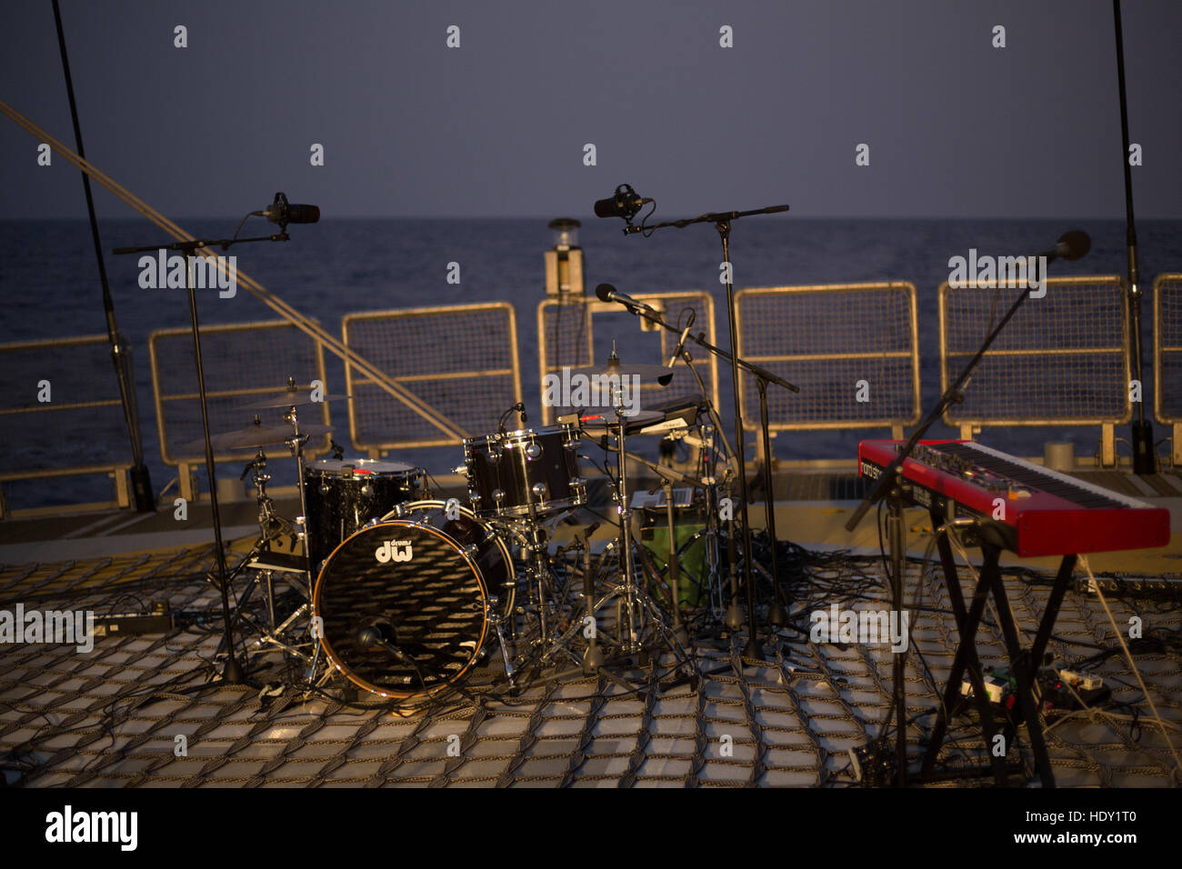 Musical instruments set up on the deck of a ship, at sea Stock Photo ...